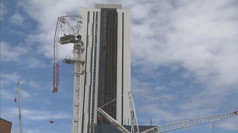 Further delays expected to remove snapped crane hovering over caravan park