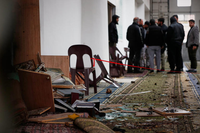 Hundreds mourn in Syria's Homs after deadly mosque bombing