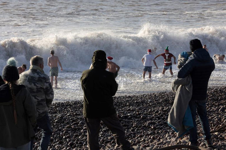 Survivor describes 'worst conditions' as two men swept out to sea in ...