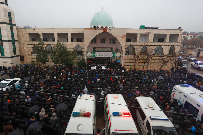 Hundreds mourn in Syria's Homs after deadly mosque bombing