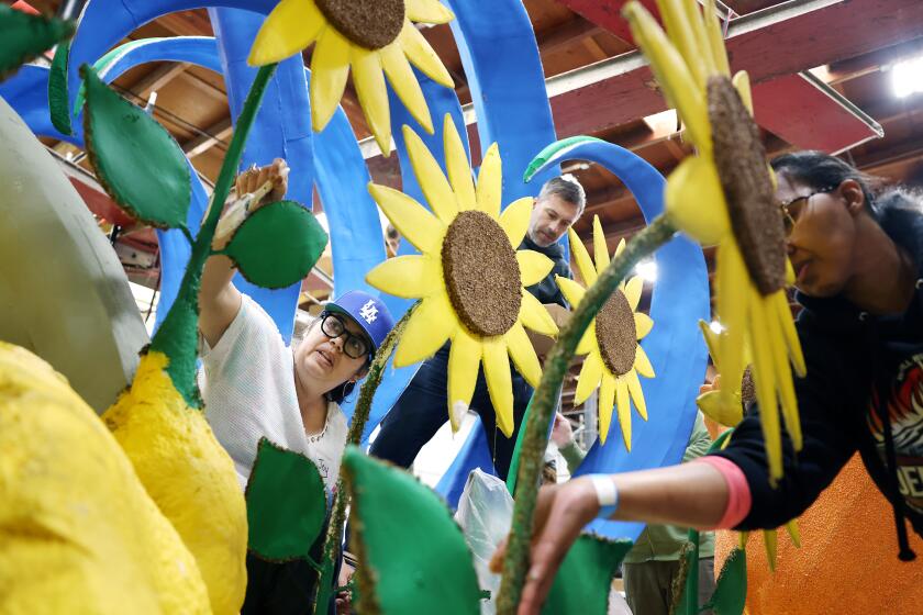 Photos: An army of volunteers getting floats prepared for the 137th ...