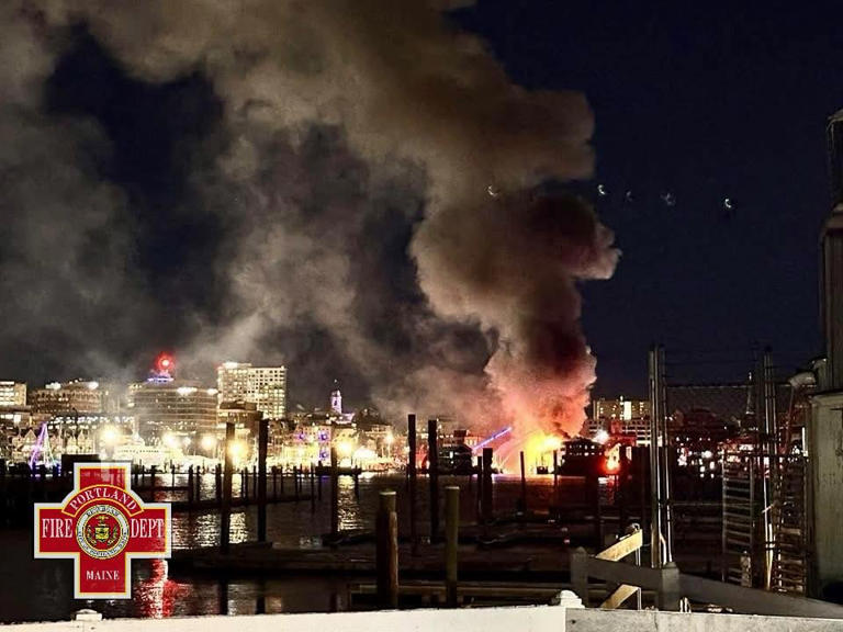 Fire damages buildings, sinks boat in New England city’s historic ...