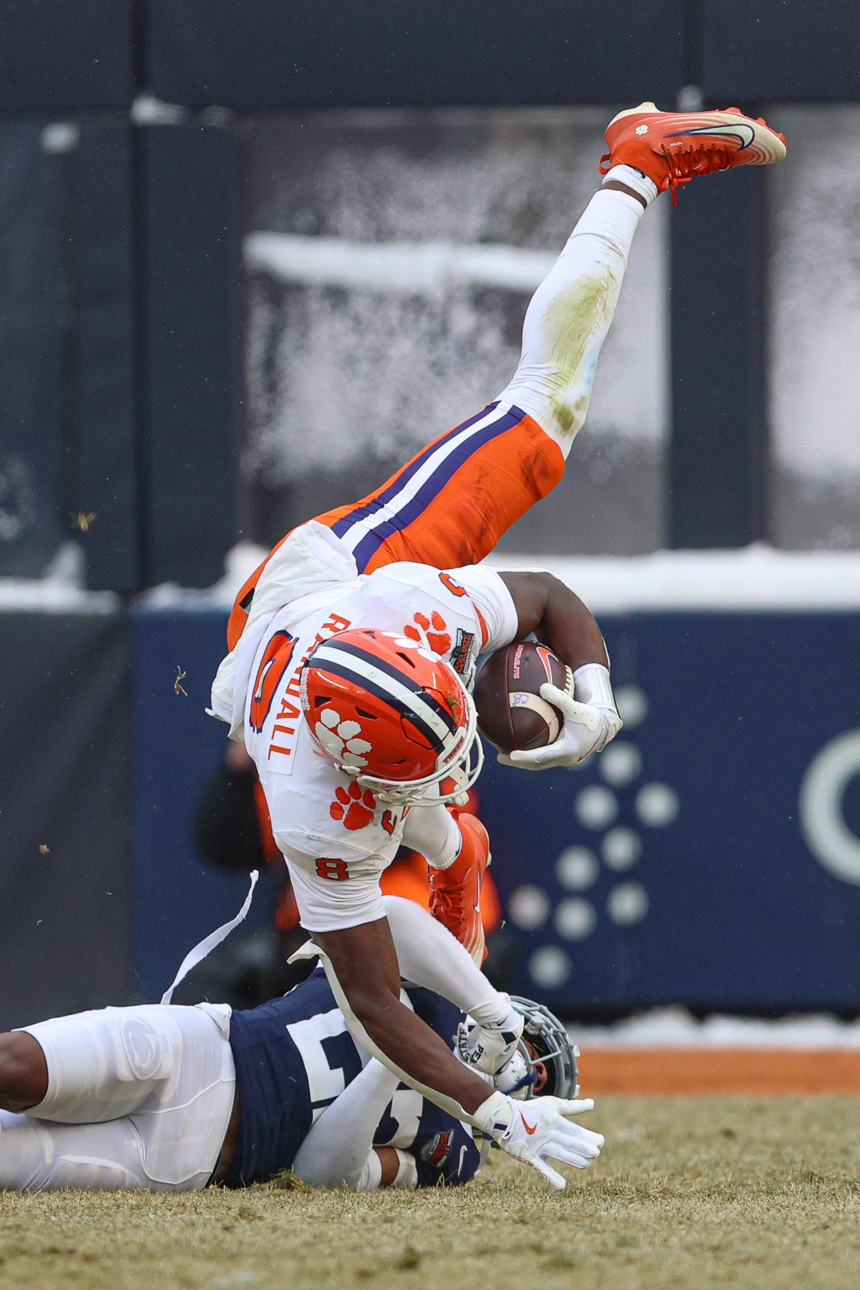 Which young defenders led Penn State football to a Pinstripe Bowl win?
