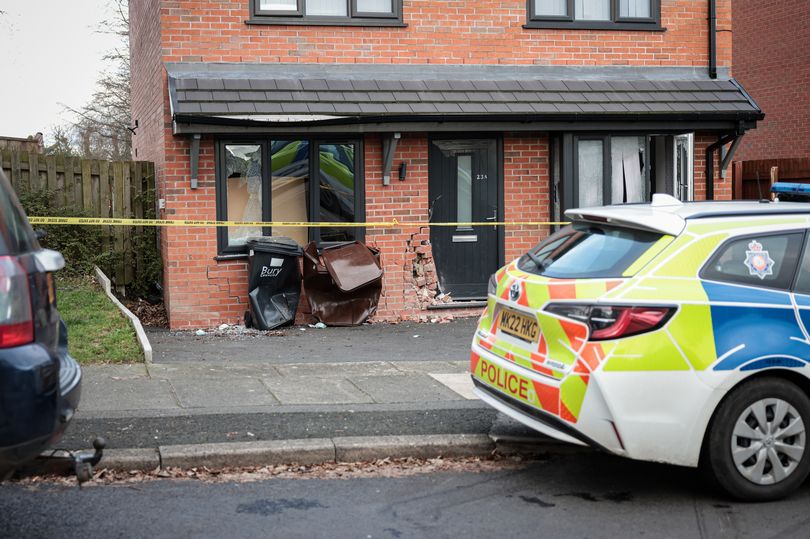 Neighbours wake to police in street after car 'goes into front' of ...