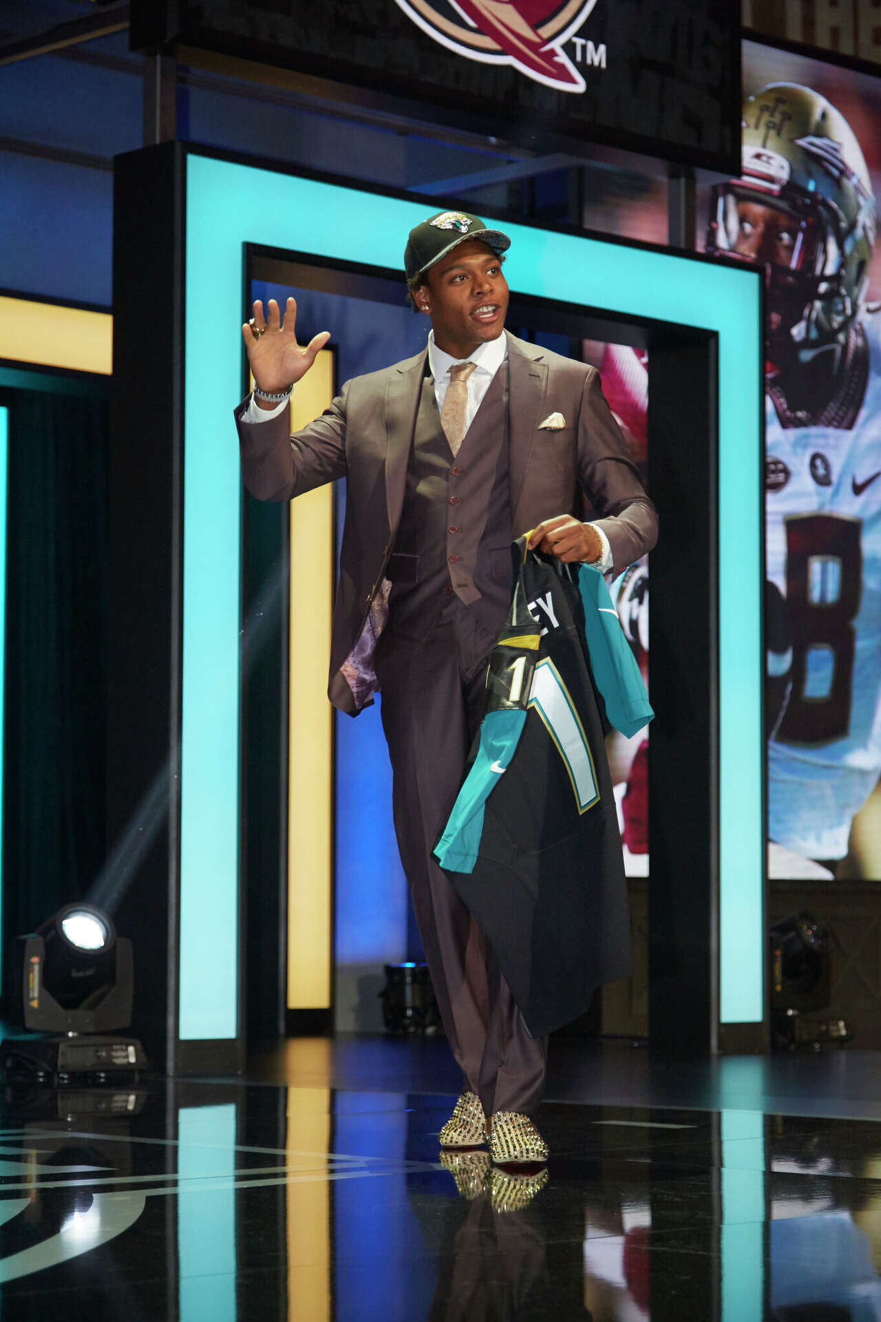 Meet the guy who gave Arch Manning his suit glow up