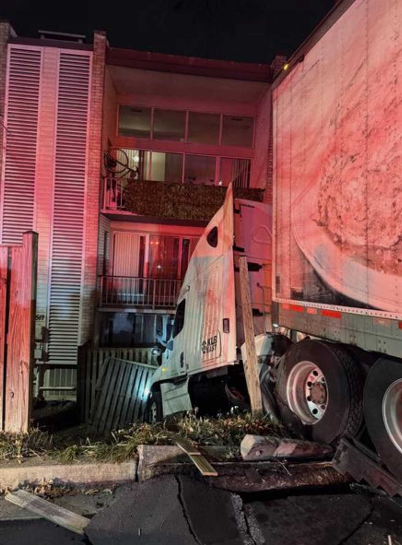 Runaway tractor-trailer nearly slams into Maryland apartment building ...