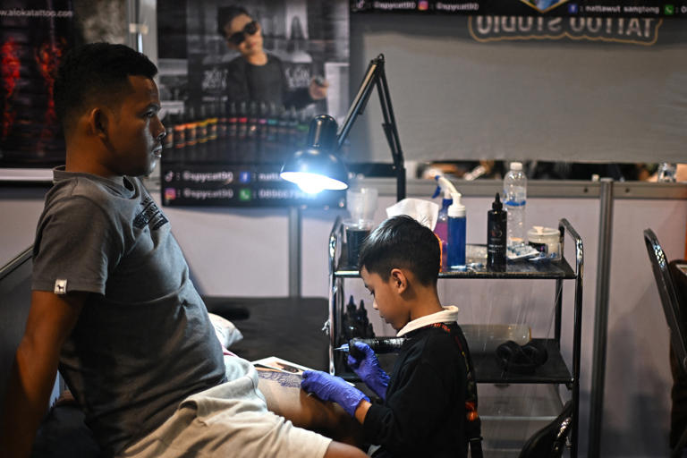 Nine-year-old tattoo artist makes his mark with expert work!