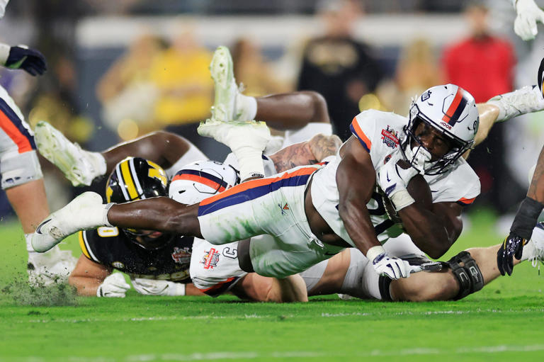 Virginia sets school record for wins with Gator Bowl victory over Missouri