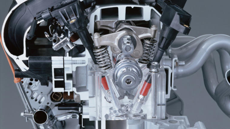 Why some 4-cylinder engines use 8 spark plugs