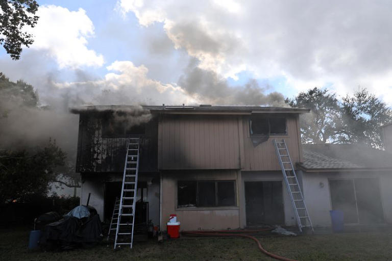 PHOTOS: Two-story home in Brandon catches fire