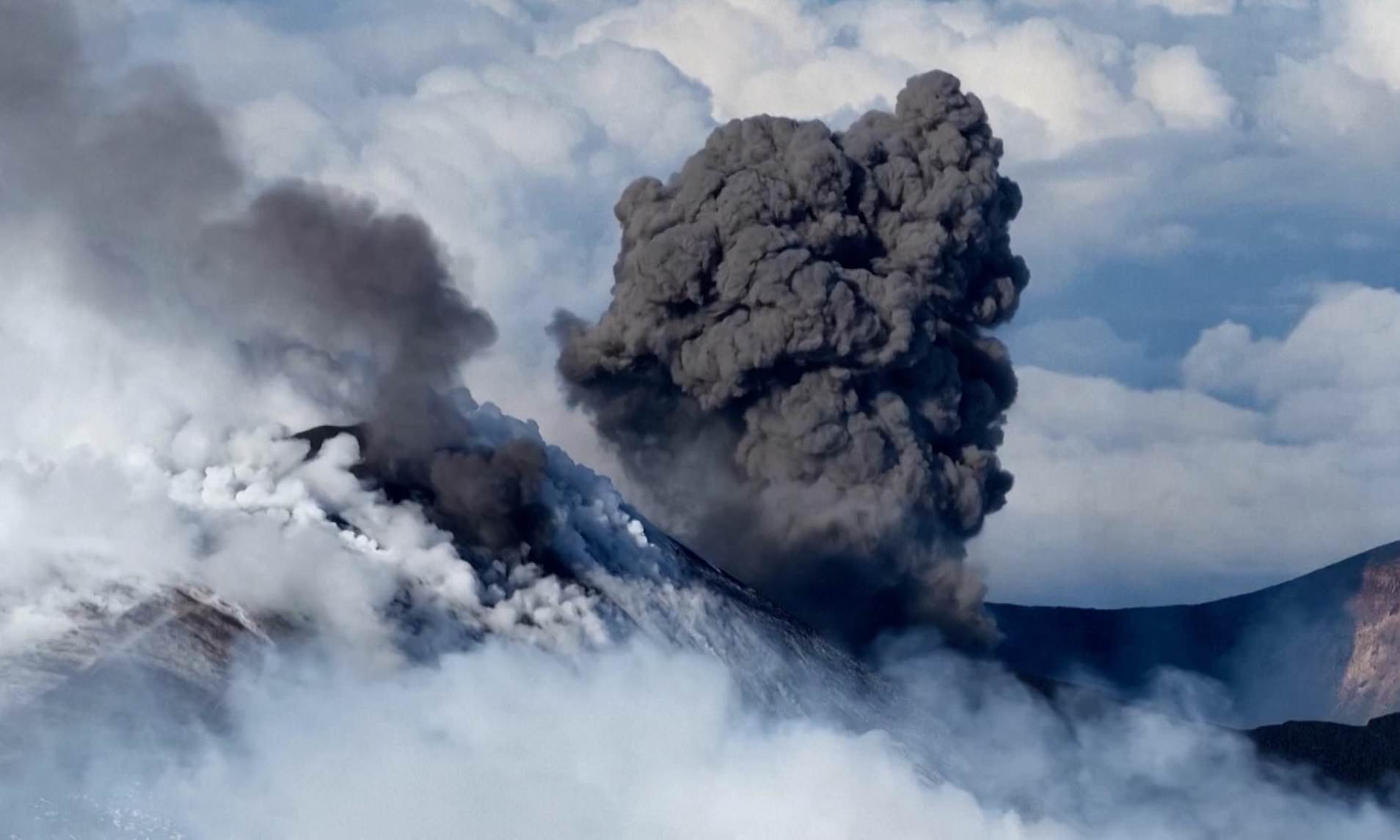 Dramatic moment Italy's Mount Etna shoots up thick plumes of volcanic ash