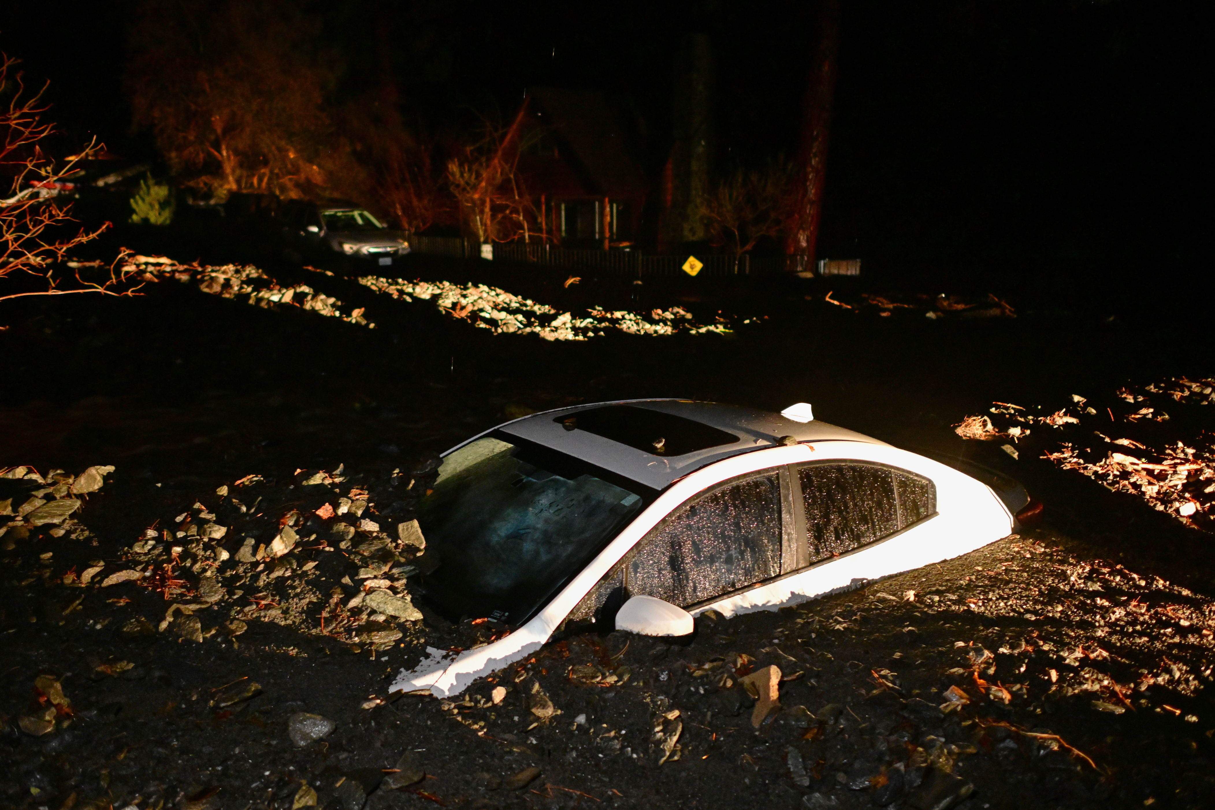 One dead after car found submerged amid California flooding