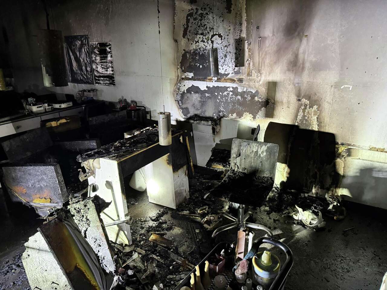 Orange salon damaged by fire at Post Road strip mall, fire crew says