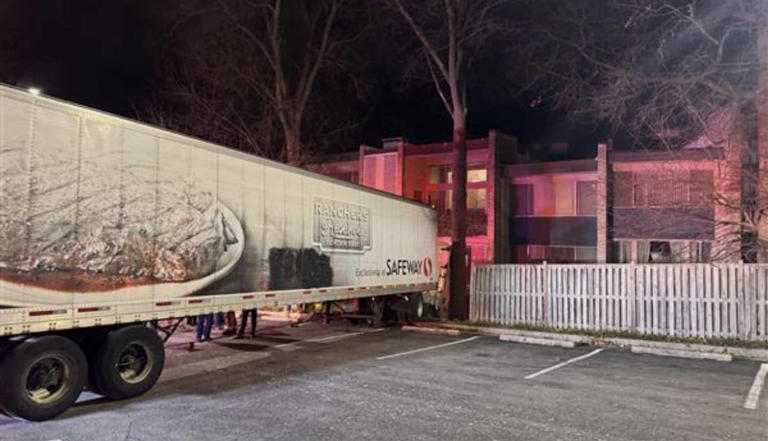 Runaway tractor-trailer nearly slams into Maryland apartment building ...