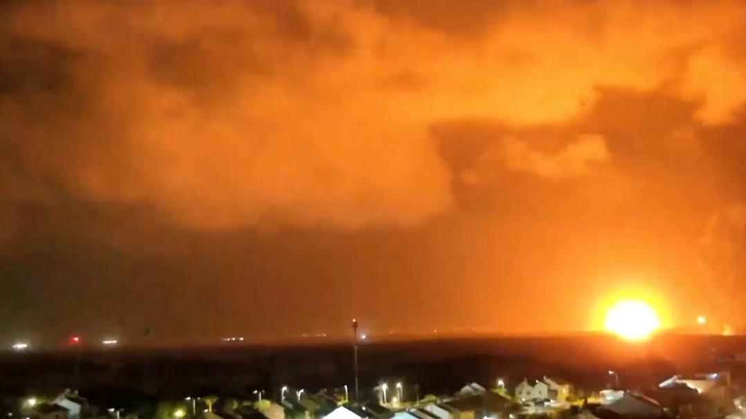 Flares light up night sky over Gaza Strip