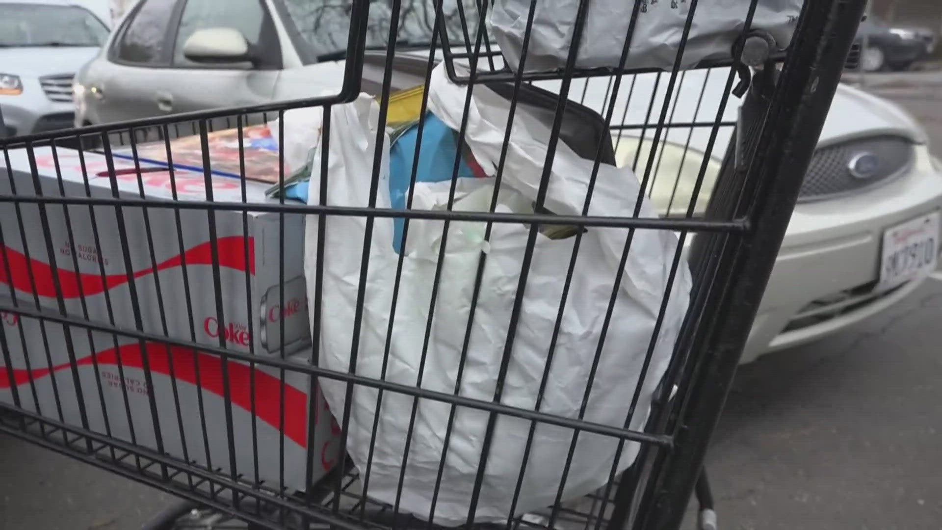 Shoppers react as plastic bags disappear from California stores ahead ...