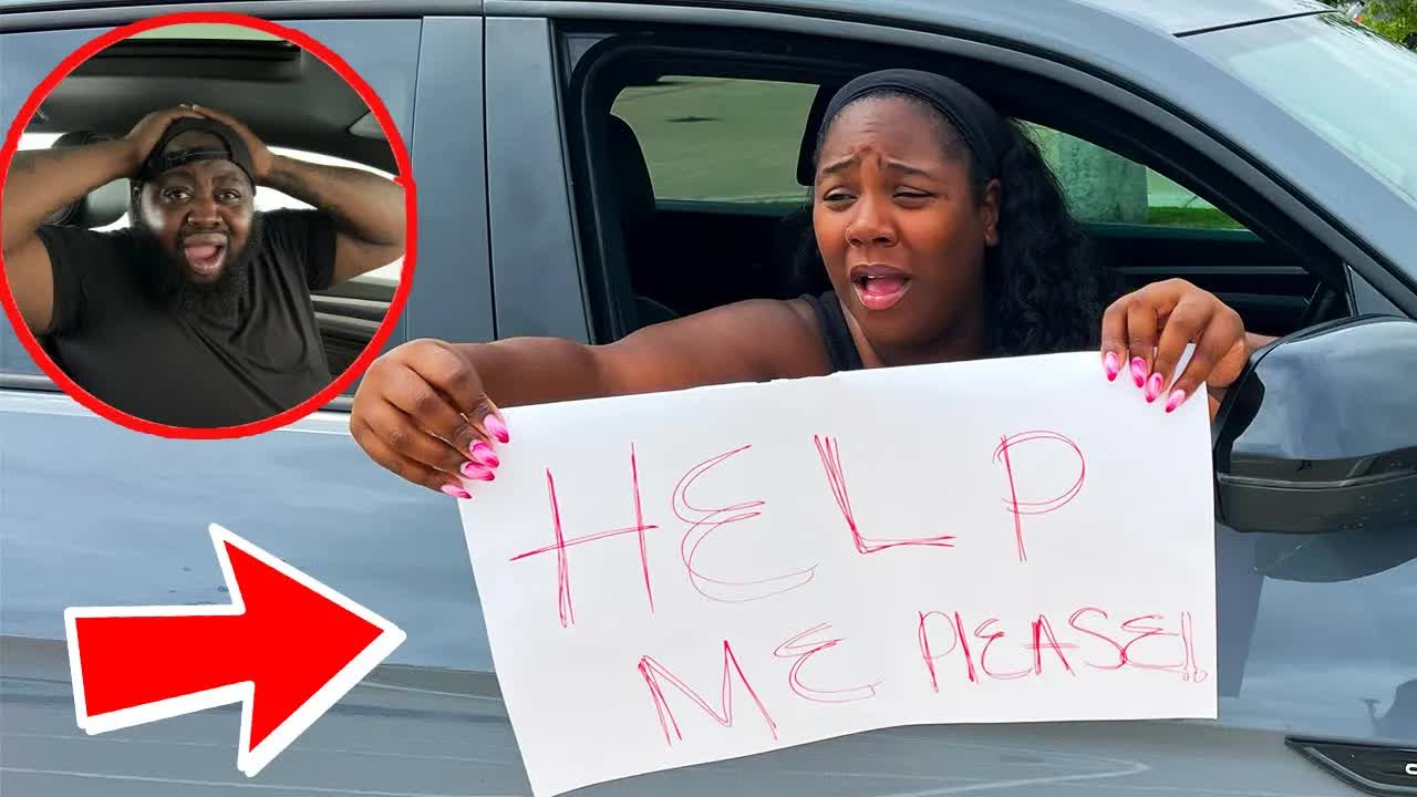 Holding a 'help me' sign out of the window prank on husband 😱!