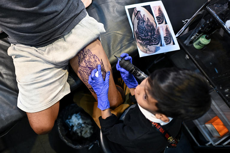 Nine-year-old tattoo artist makes his mark with expert work!