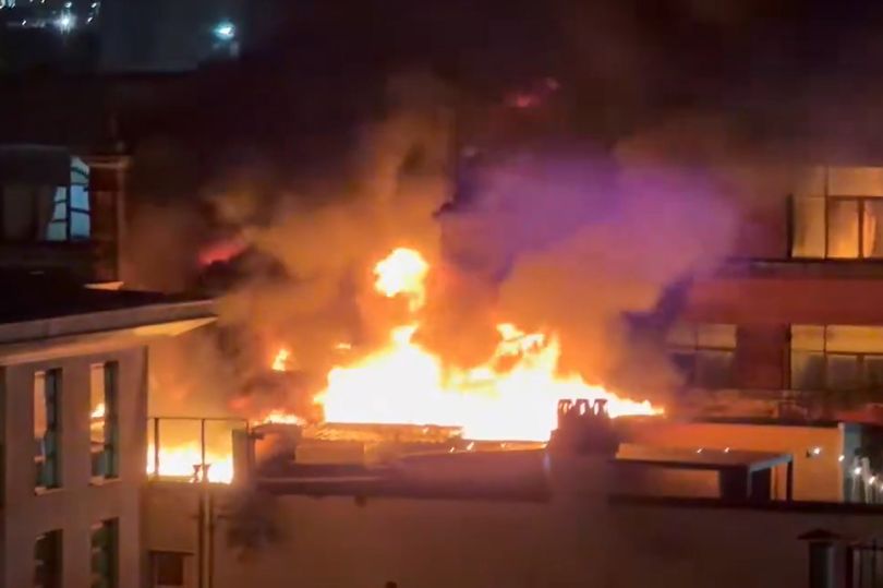 Glasgow hotel fire 'not wilful' as emergency services remain at scene