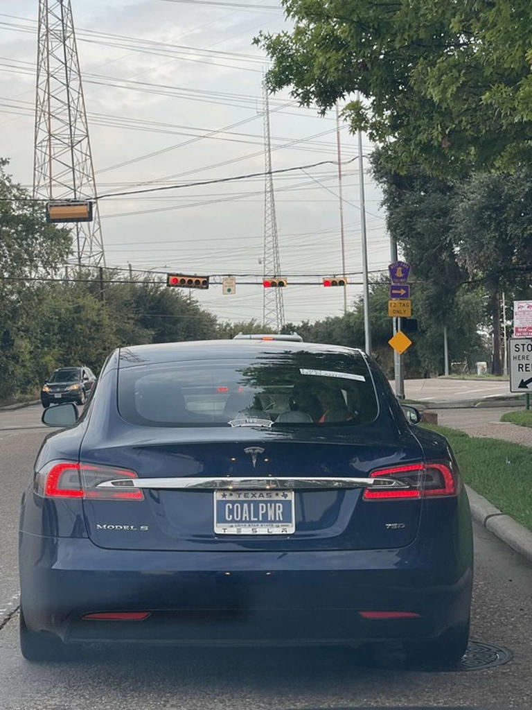 Why Houston's Tesla drivers put oil, gas and coal on their license plates