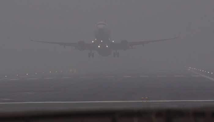 Travel alert: Dense fog disrupts flights and train services, IMD issues ...