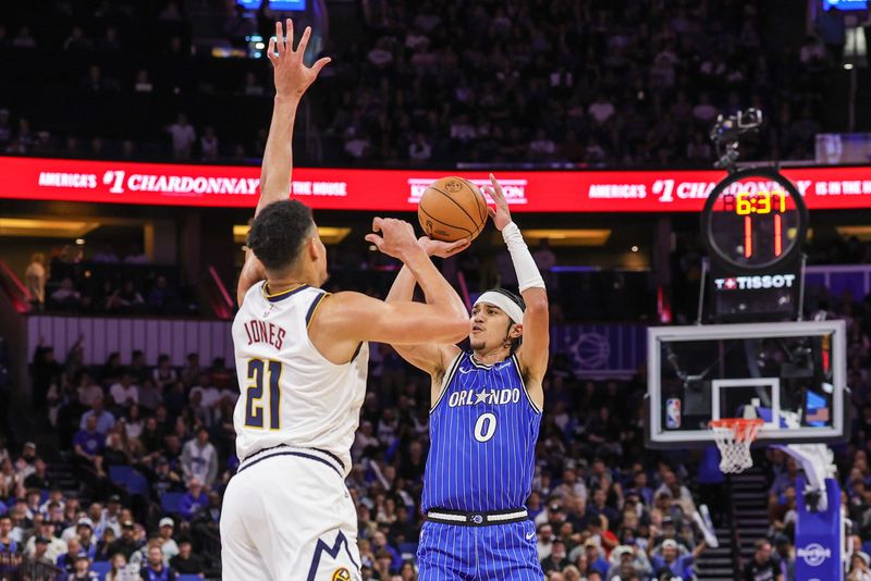 NBA roundup: Magic pull escape act, upend Nuggets
