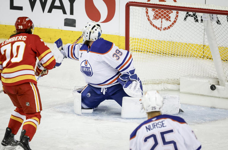 Flames remain hot at home, burn Oilers 3-2