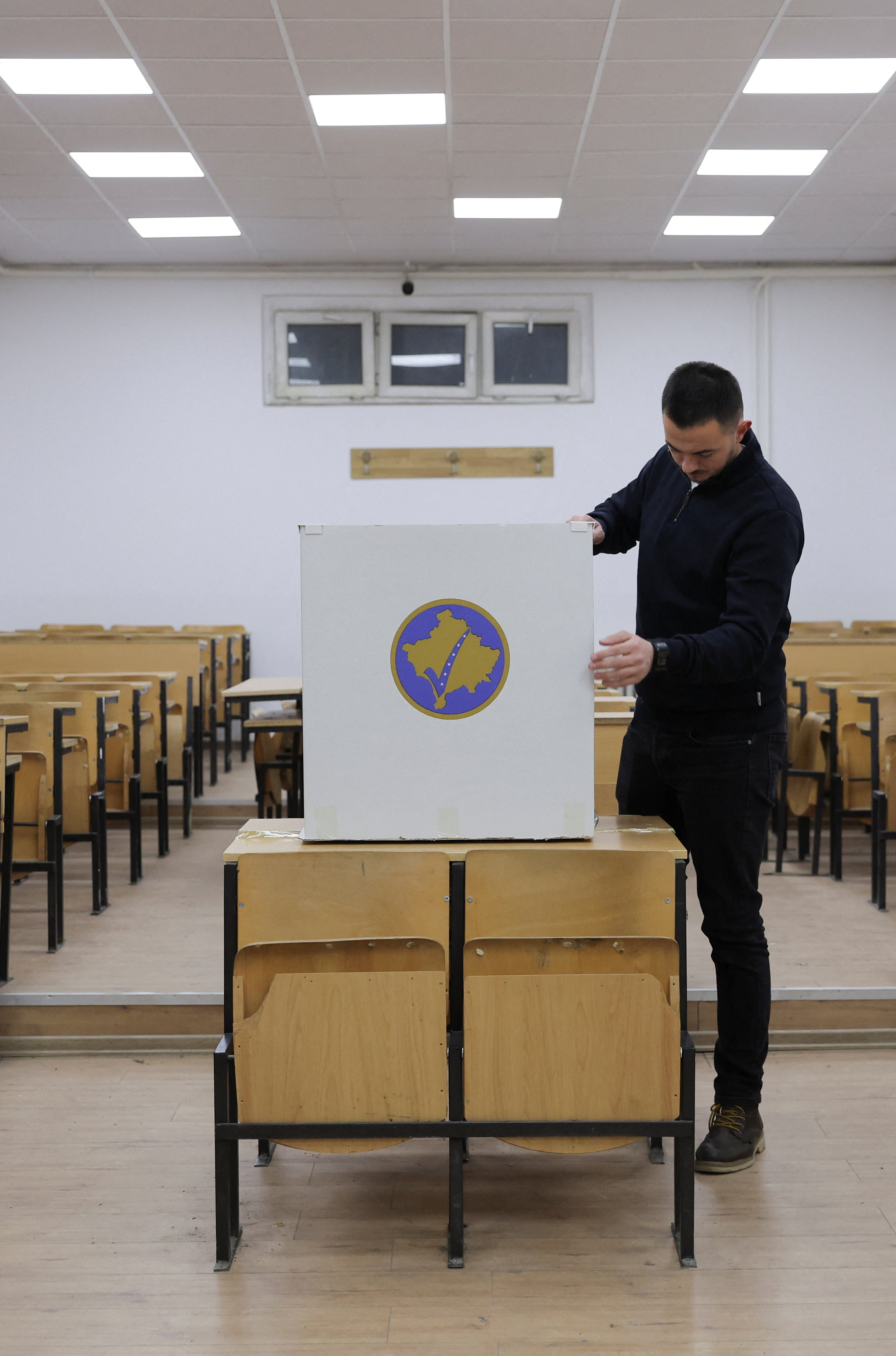 Kosovo votes in snap election to end a year of political deadlock
