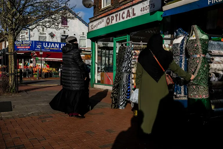Multicultural UK town bids to turn page on troubled past