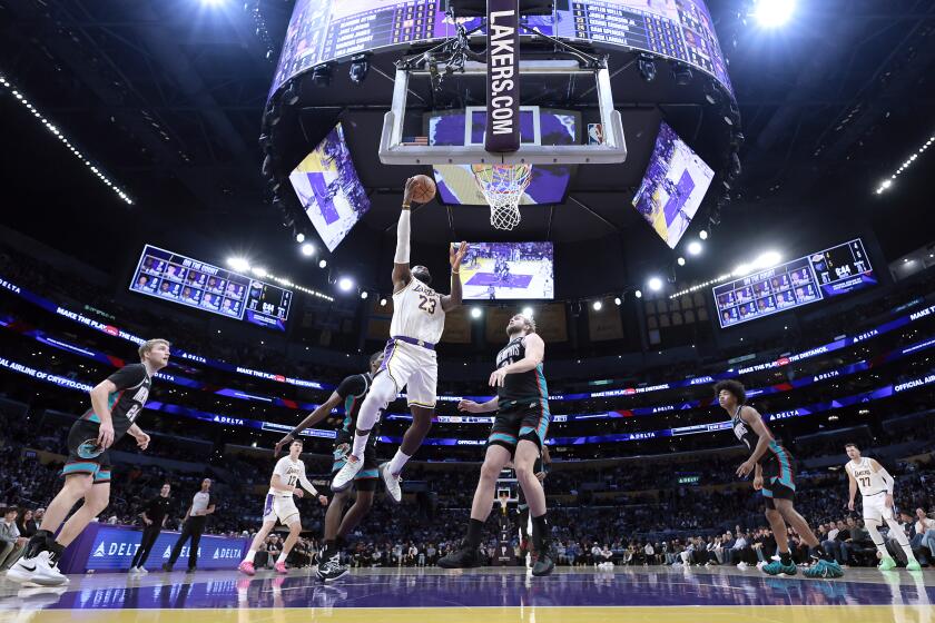 Luka Doncic and LeBron James lead Lakers comeback to beat the Grizzlies ...