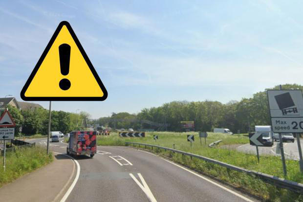 Police direct traffic at A127 Fortune of War with road partially blocked