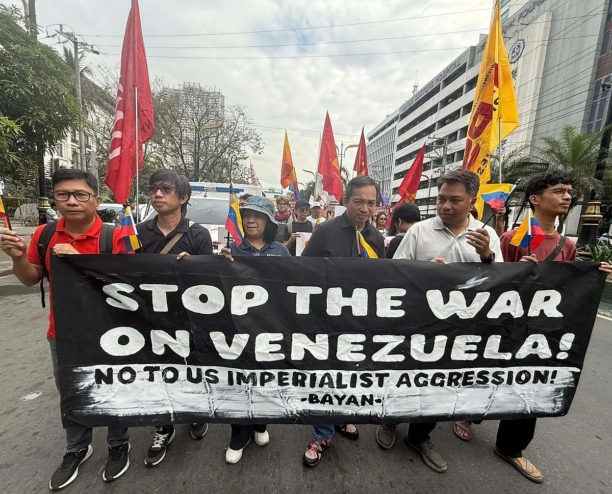 Over 200 Filipinos burn US flags, condemn capture of Venezuelan ...