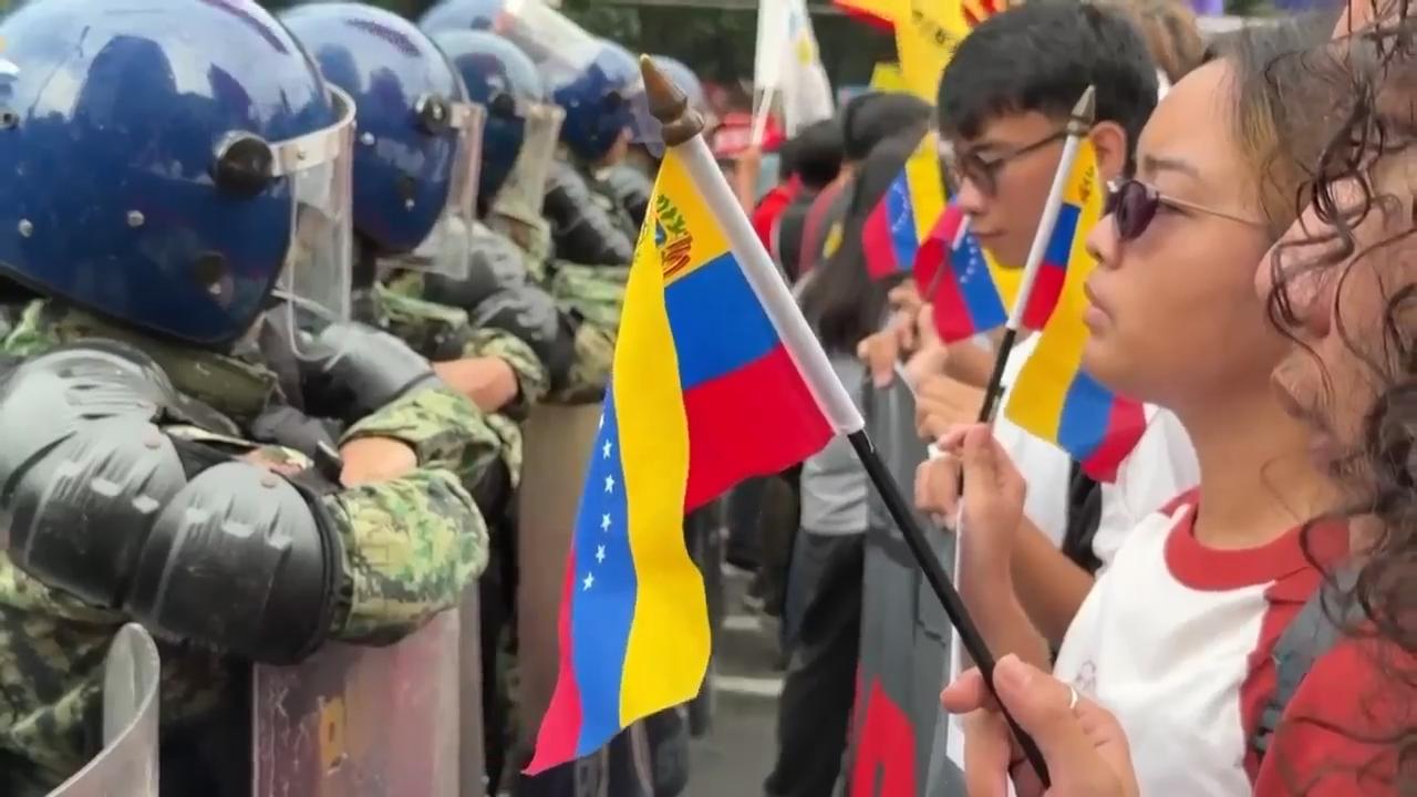 Protesters gather outside US Embassy in Manila to denounce military ...