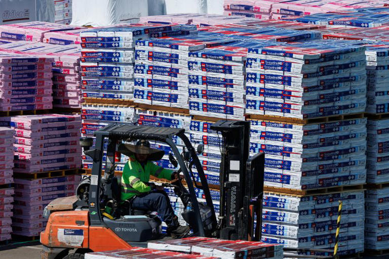 Apollo-led investors to commit $1.2 billion in building products firm QXO