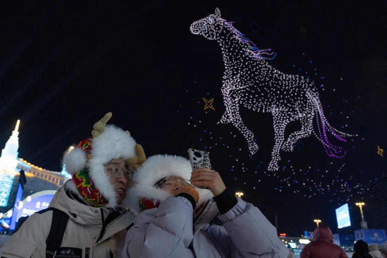Harbin ice festival draws sculptors and spectators to northern China ...