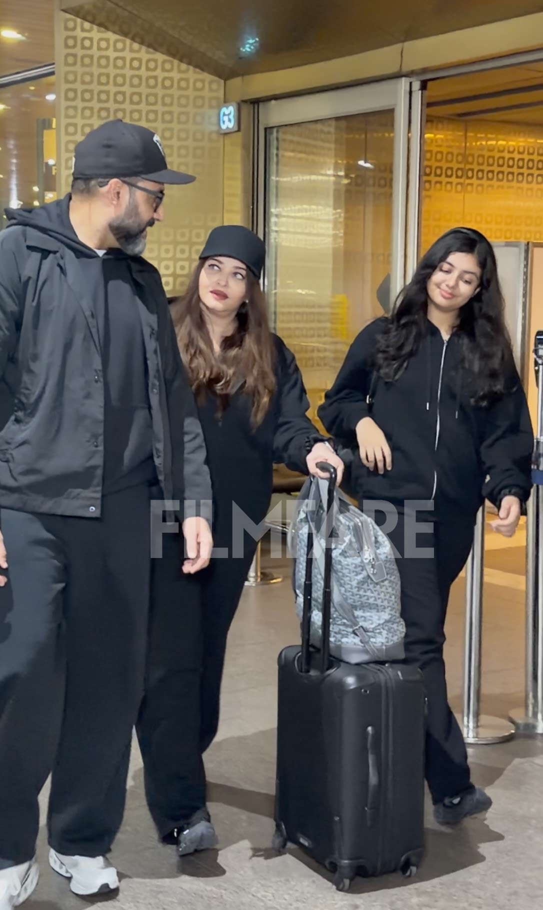 Photos: Abhishek, Aishwarya Rai & Aaradhya Bachchan return to city ...