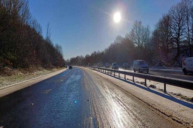 Police close M53 after crash involving two cars