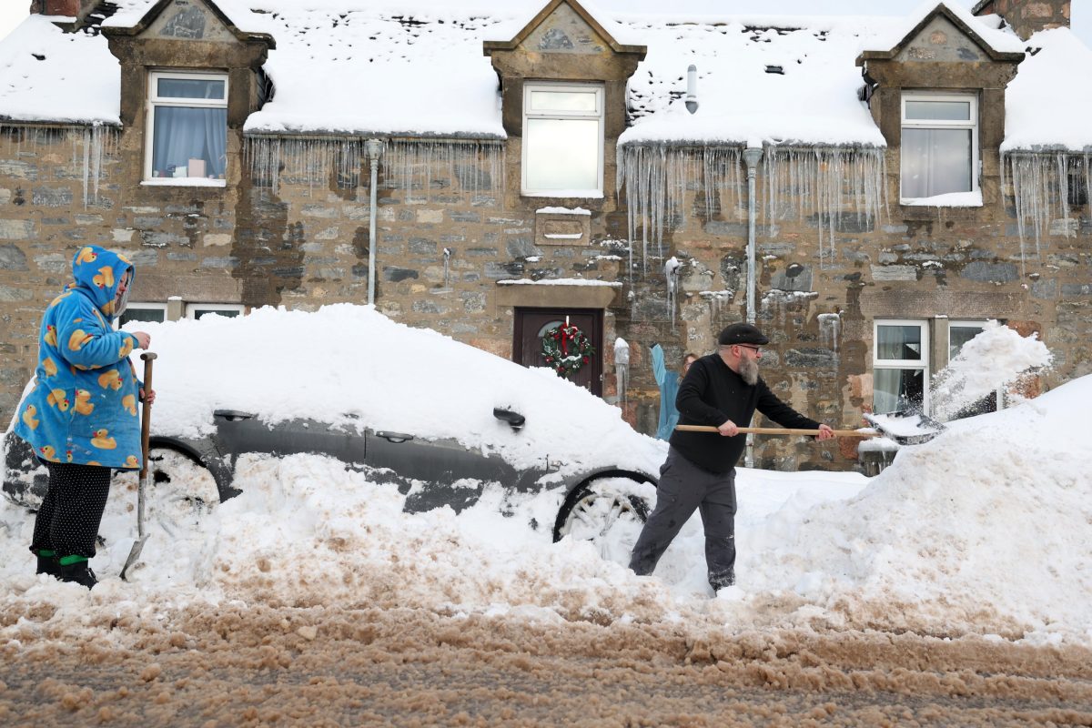 Snow closes schools as ice warnings cover UK after temperature plunges ...