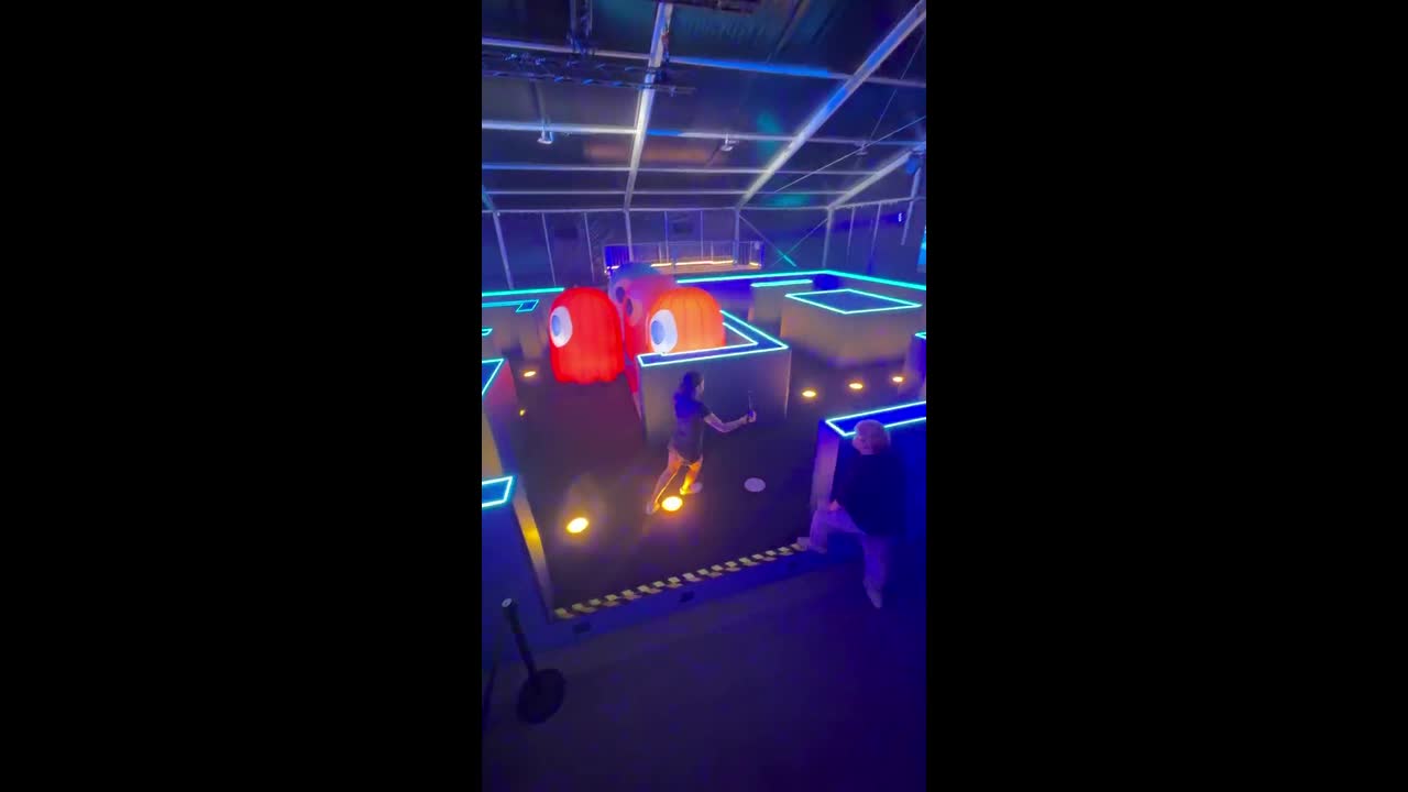 Woman dodges costumed ghosts in life‑sized Pac‑Man maze—Singapore ...