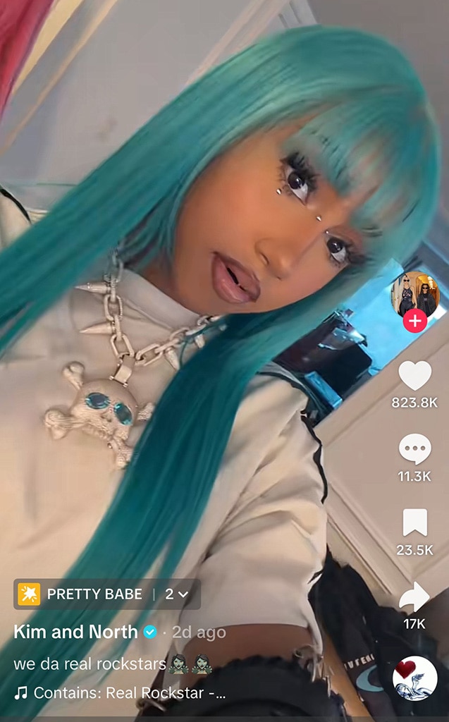 North West debuts bridge piercing and all-black grills