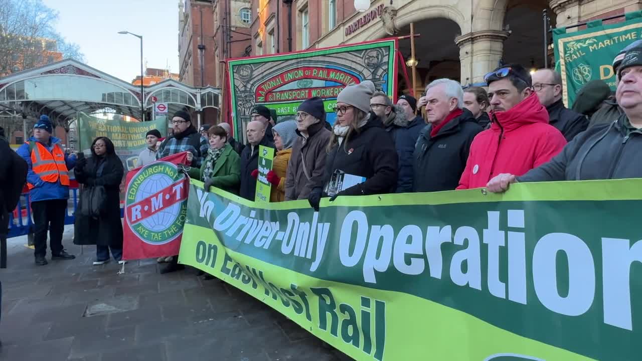 John McDonnell MP threatens industrial action at RMT protest against ...
