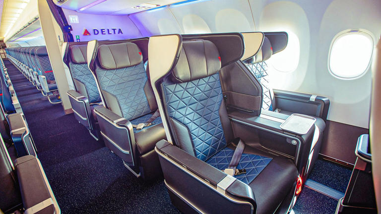 How much does it cost to upgrade to first class on Delta Air Lines?