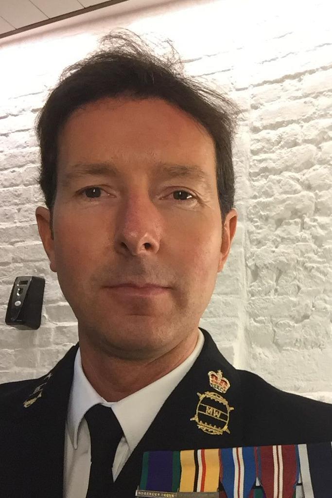 How fake admiral was caught out by massive sword and rare medal
