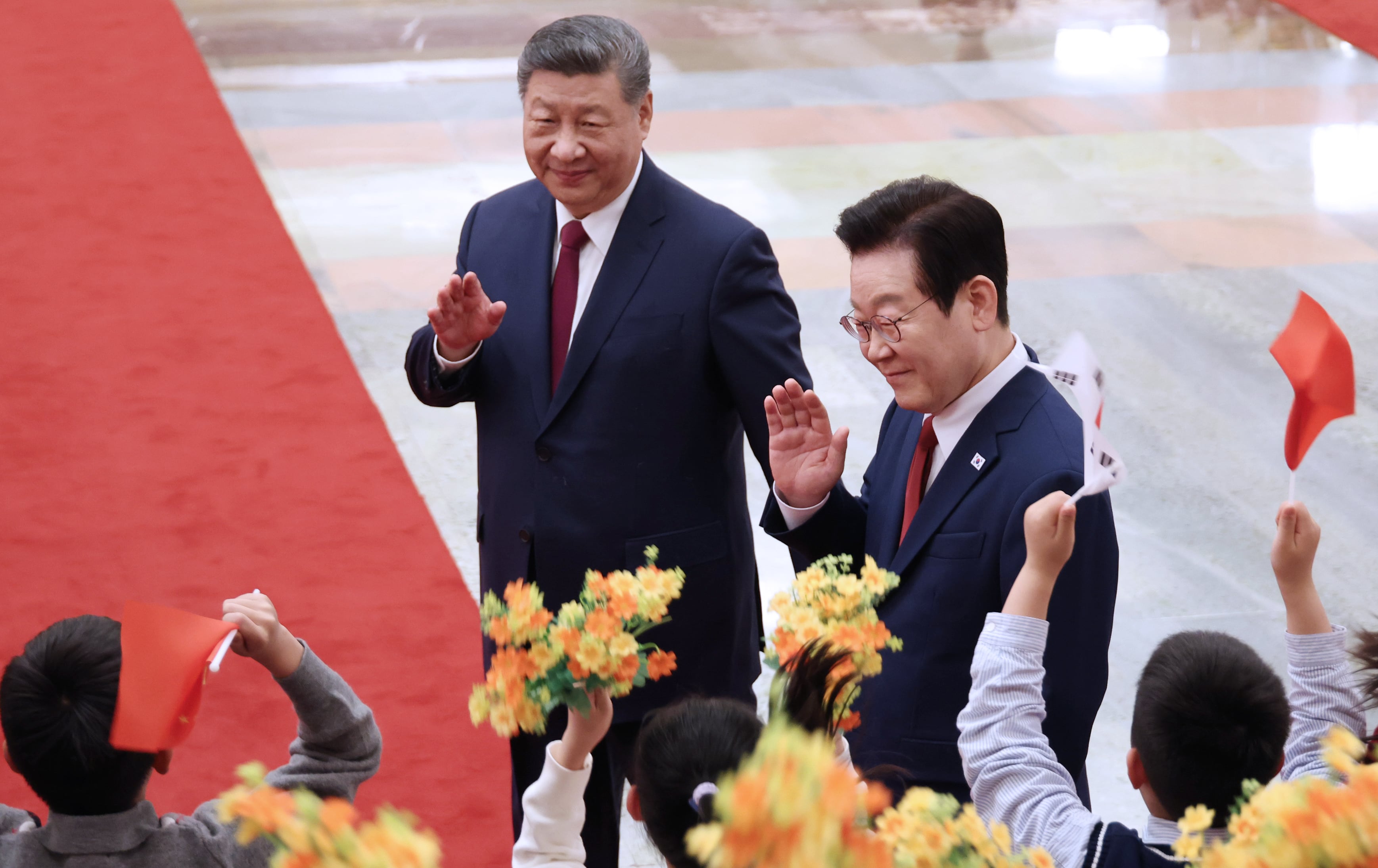 Xi, Lee vow to uphold peace, historical ties against militarism