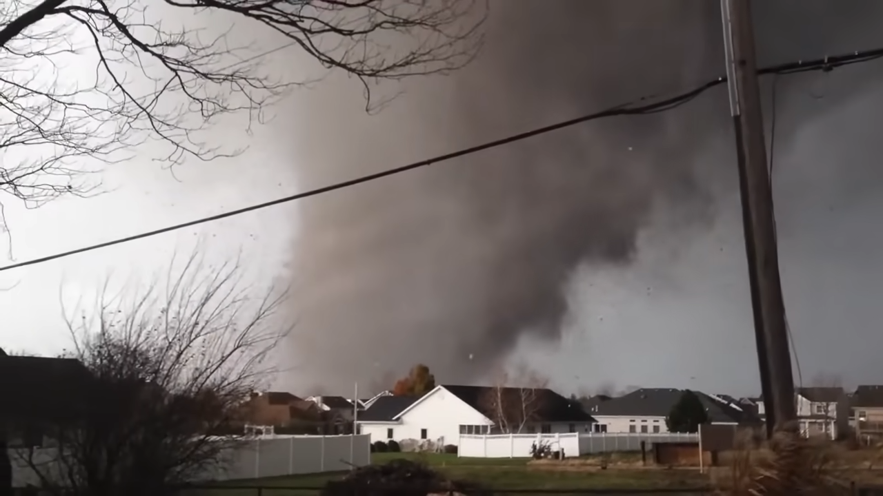 Get in the house now - seconds before the tornado hit