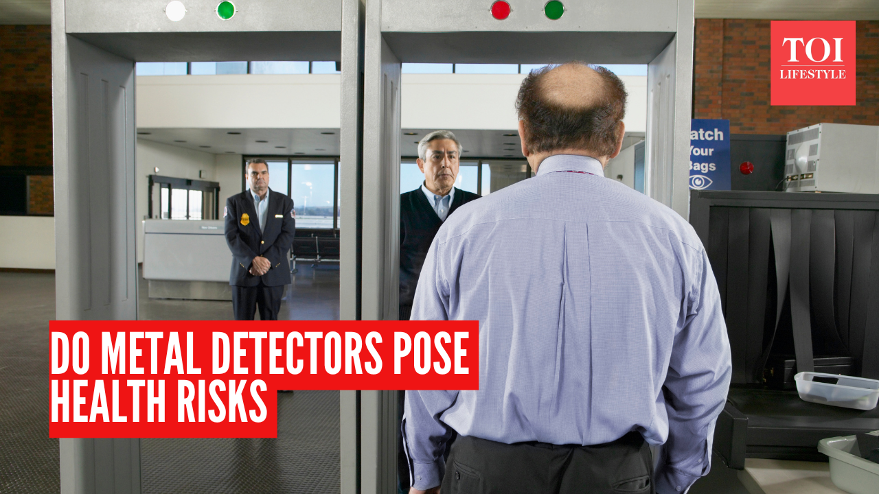 Are there any health risks of walking through metal detectors?