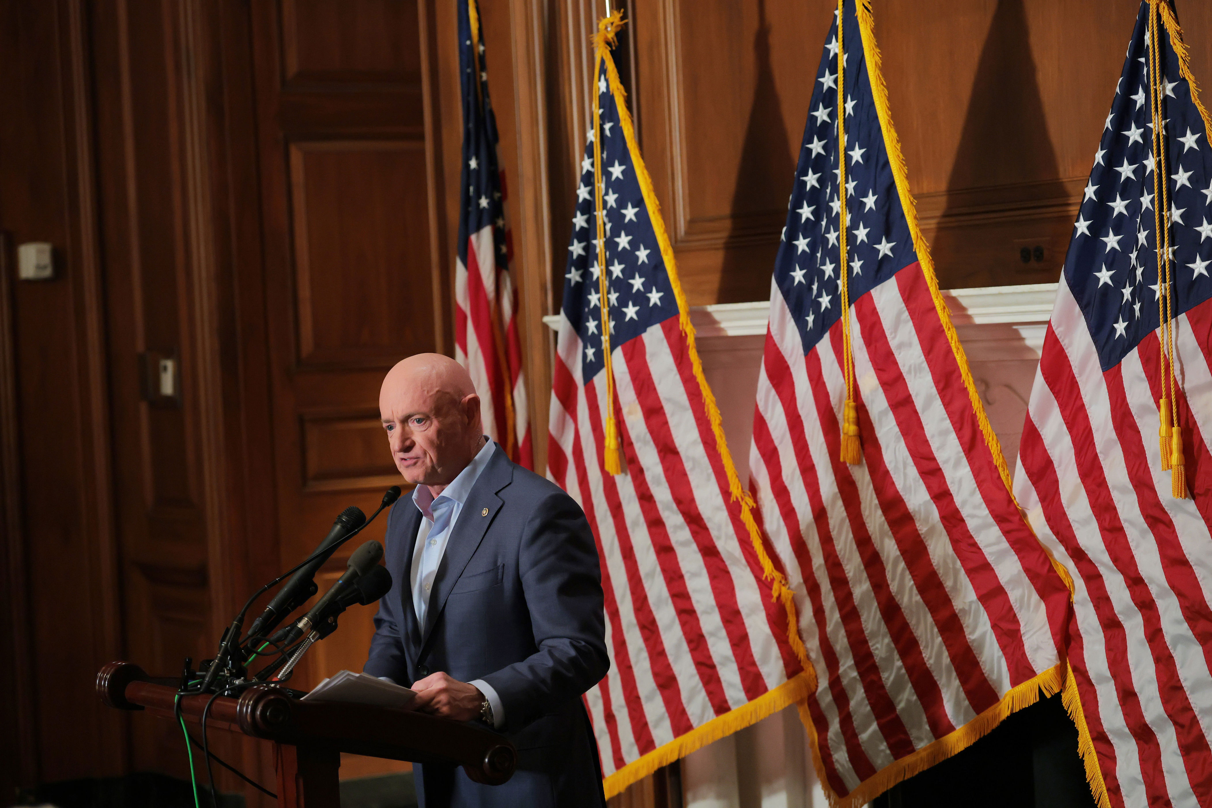 Mark Kelly has retired pay cut by Pentagon over 'illegal orders video'