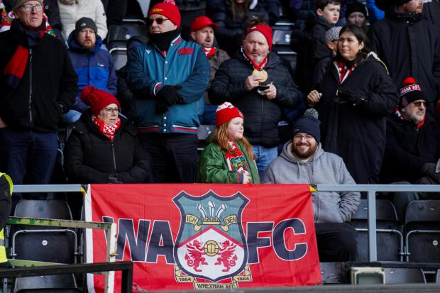 Thousands of fans battle snow to watch Wrexham beat Derby at Pride Park