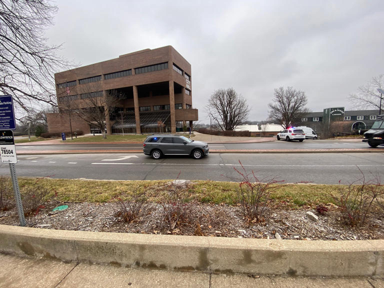 Male suspect shot, killed in altercation with employee at Lawrence City ...