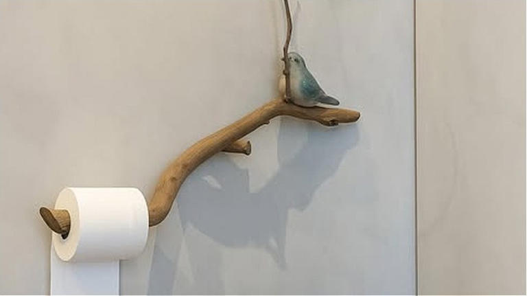Would you try this rustic DIY toilet paper holder in your home?